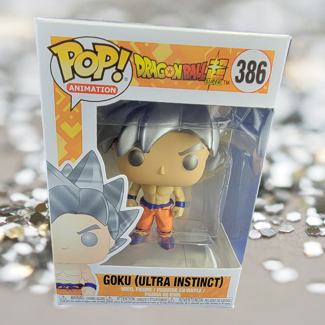 Goku (ultra instinct) funko # 386 (nib) With pop protector – SpeedAndGrace